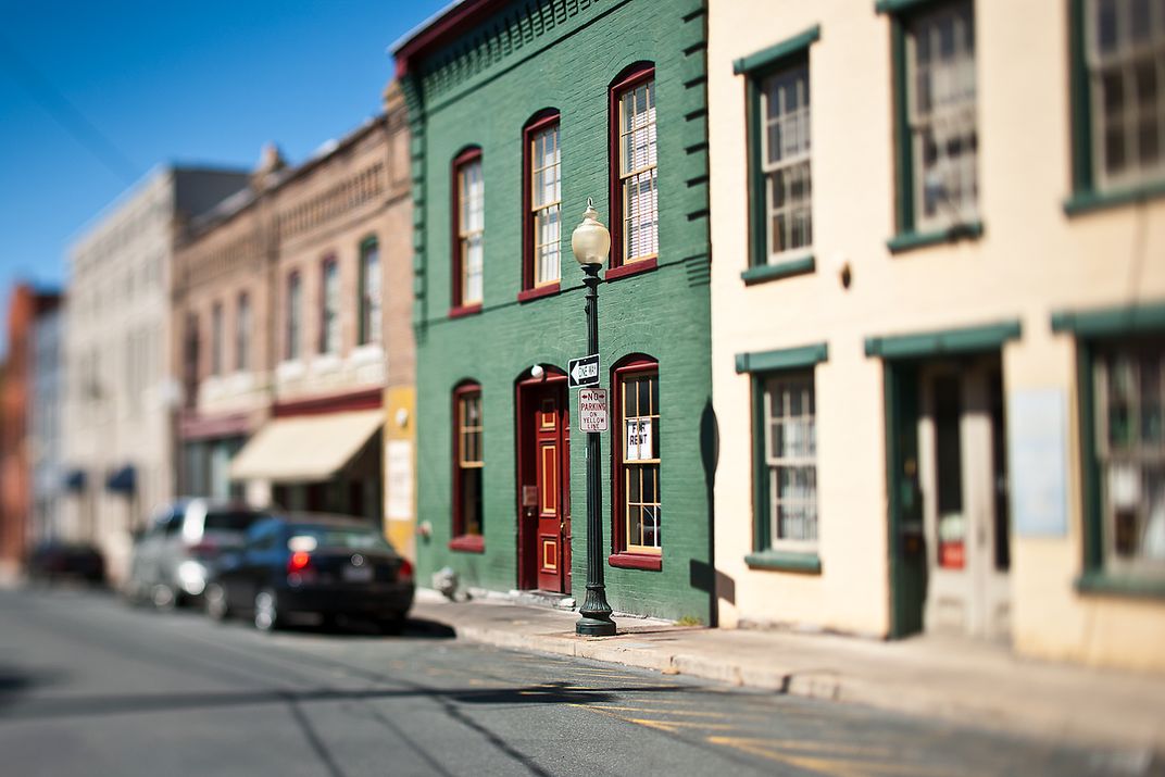 Storefronts along a main road in a small town in Virginia are captured ...