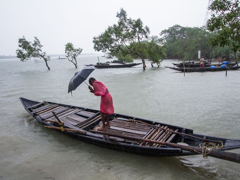 A fisherman with his boat in the monsoon. | Smithsonian Photo Contest ...