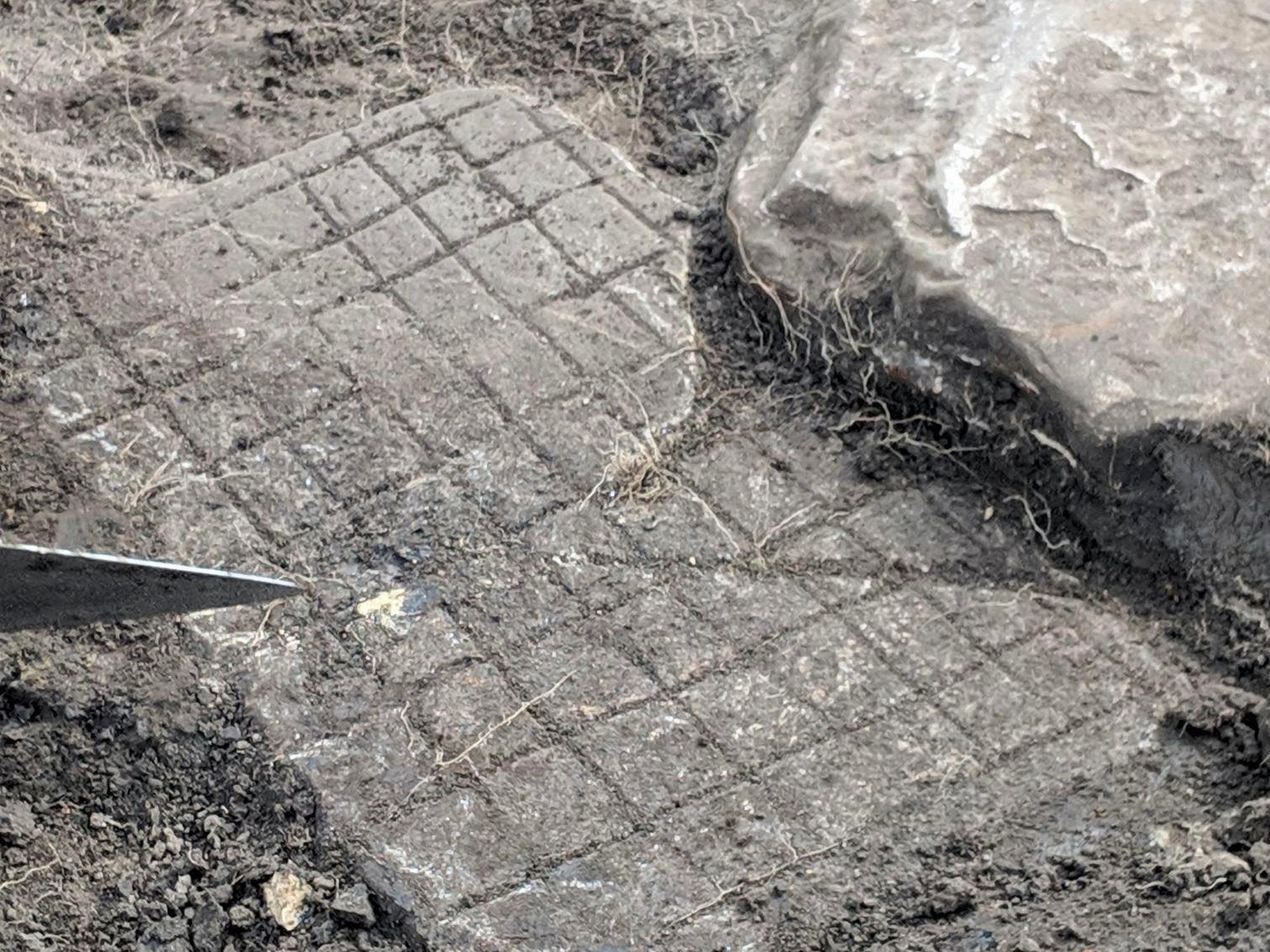 Archaeologists Uncover an Ancient Roman Game Board at Hadrian's Wall