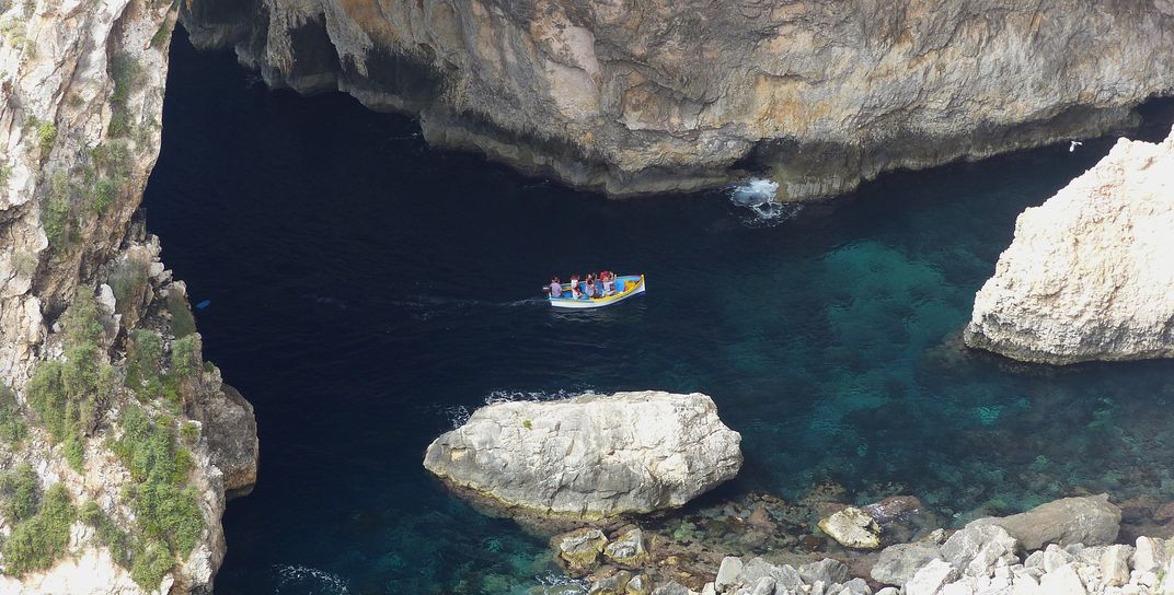 Tourist boat approaching 'Ghar Lapsi' | Smithsonian Photo Contest ...
