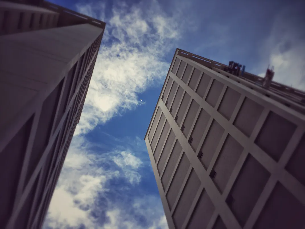 Cloud over the building | Smithsonian Photo Contest | Smithsonian Magazine