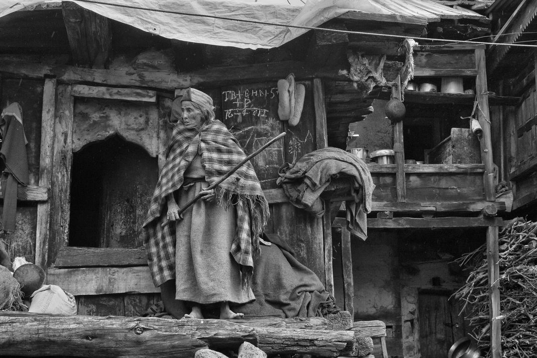 This photograph explores the relationship of the old lady and her old ...