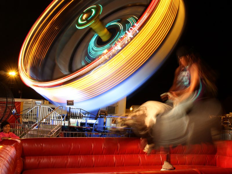 Woman riding a Mechanical Bull at the Fair | Smithsonian Photo Contest ...