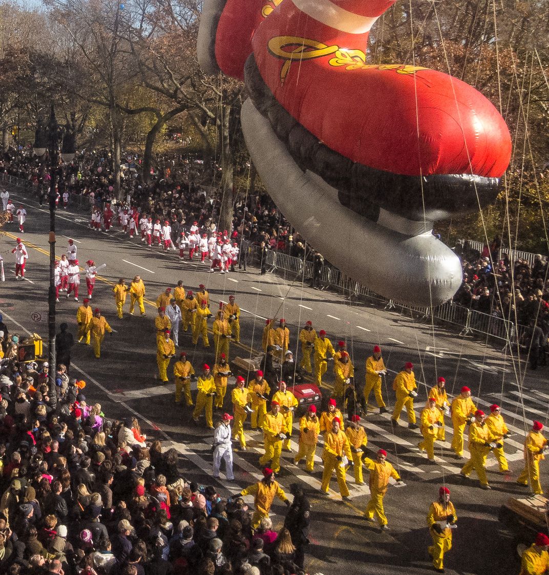 The big foot of a float towering over onlookers at the Macy's Day ...