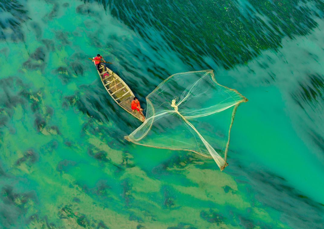 Fishing in bright colorful algae | Smithsonian Photo Contest ...