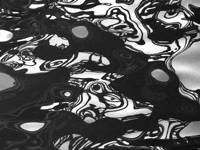 Warring Water Demons: Water pattern appeared to be various faces ...