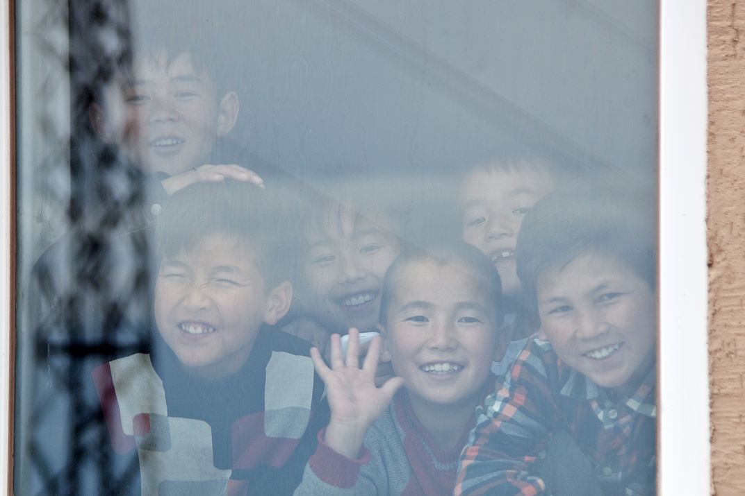 Boys in the window of a Mosque in Nalaikh Mongolia | Smithsonian Photo ...