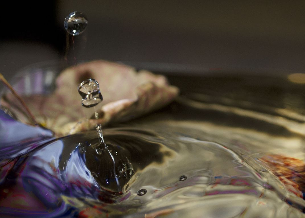 Dropping bits of colored glass into a bowl of water. | Smithsonian ...