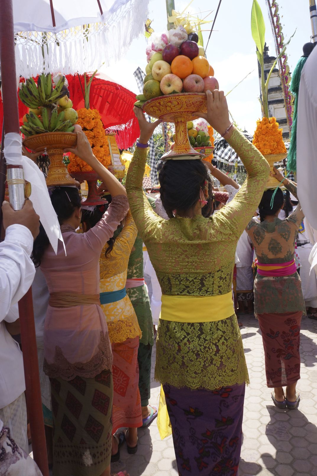 Women dressed in traditional "kerbaya" wait to enter the most sacred ...